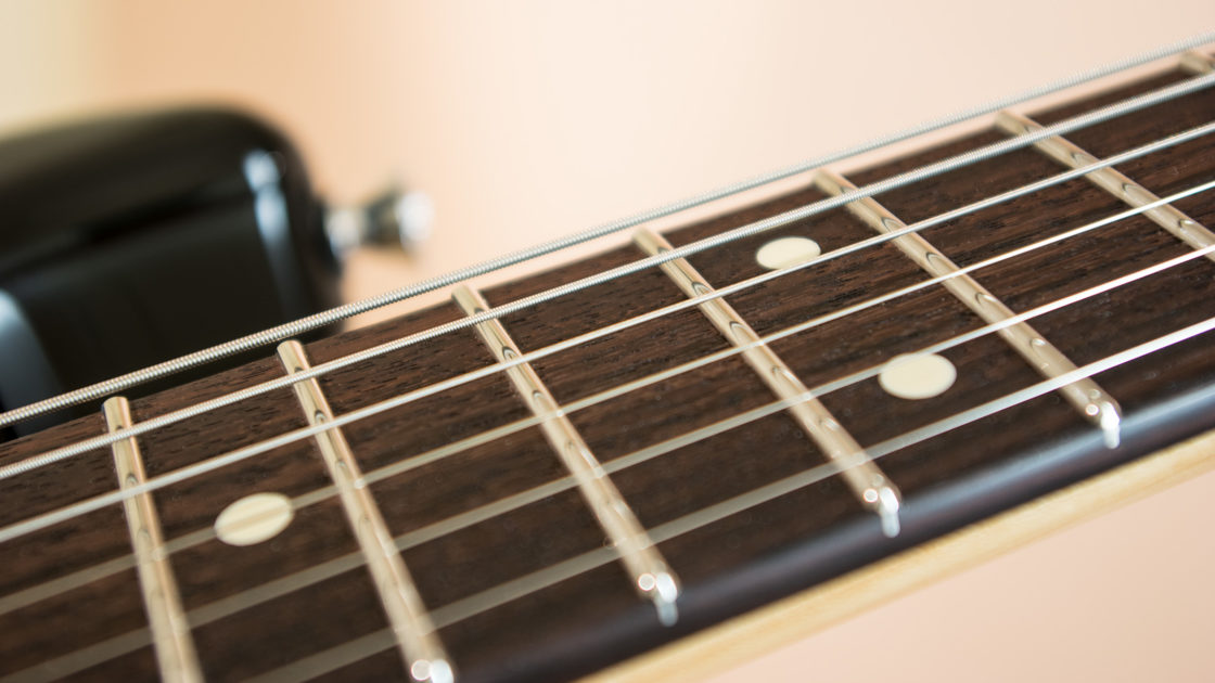What attributes make a guitar finish play, sound and look right?