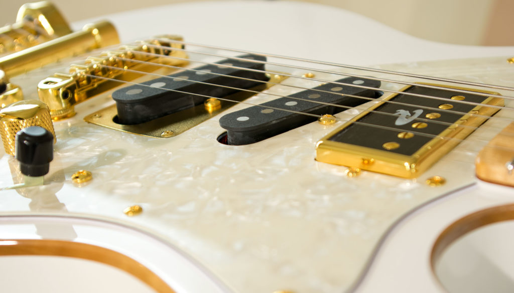 Understanding the purpose of electric guitar pickups