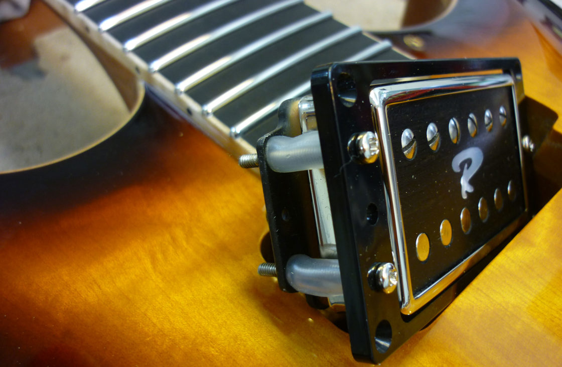Understanding the purpose of electric guitar pickups